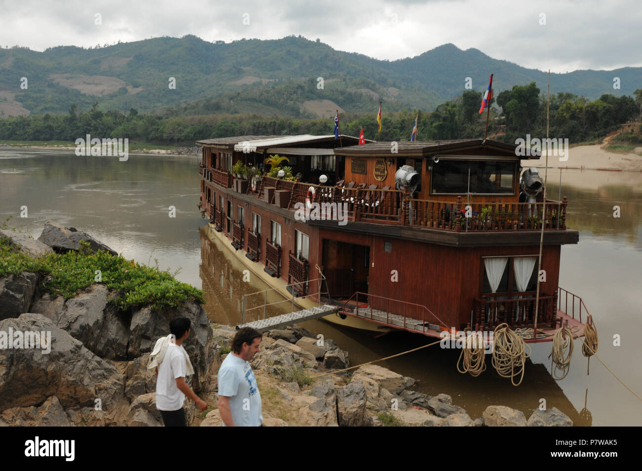 Laos: Mekong River Cruise Boat ankering at Luang Brabang City Stock ...
