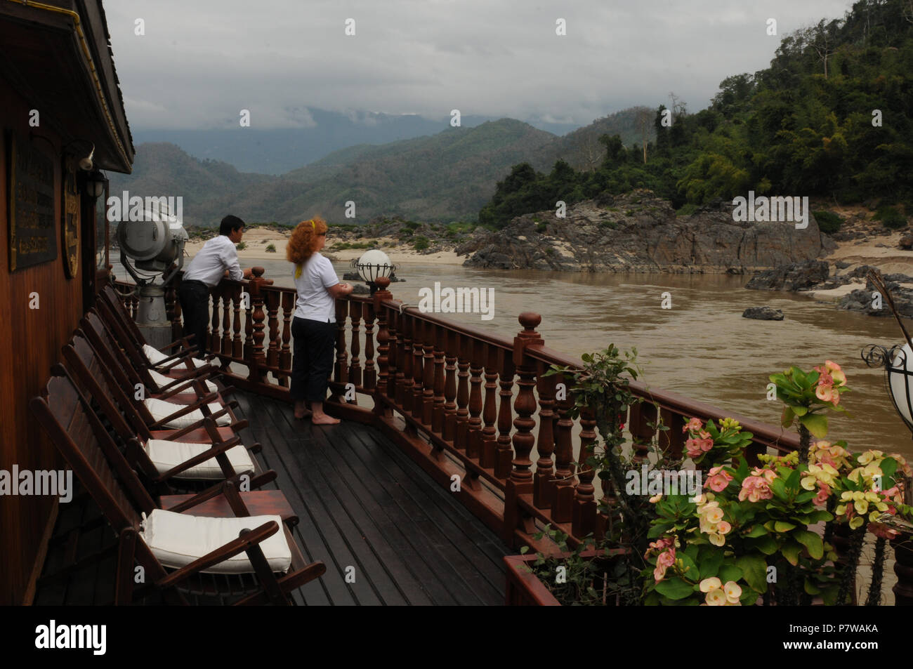 Laos: Mekong River Cruise Boat ankering at Luang Brabang City Stock ...