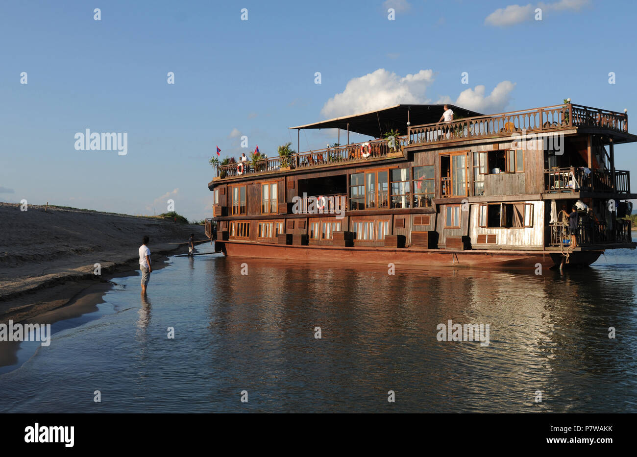 Laos: Mekong River Cruise Boat ankering at Luang Brabang City Stock ...