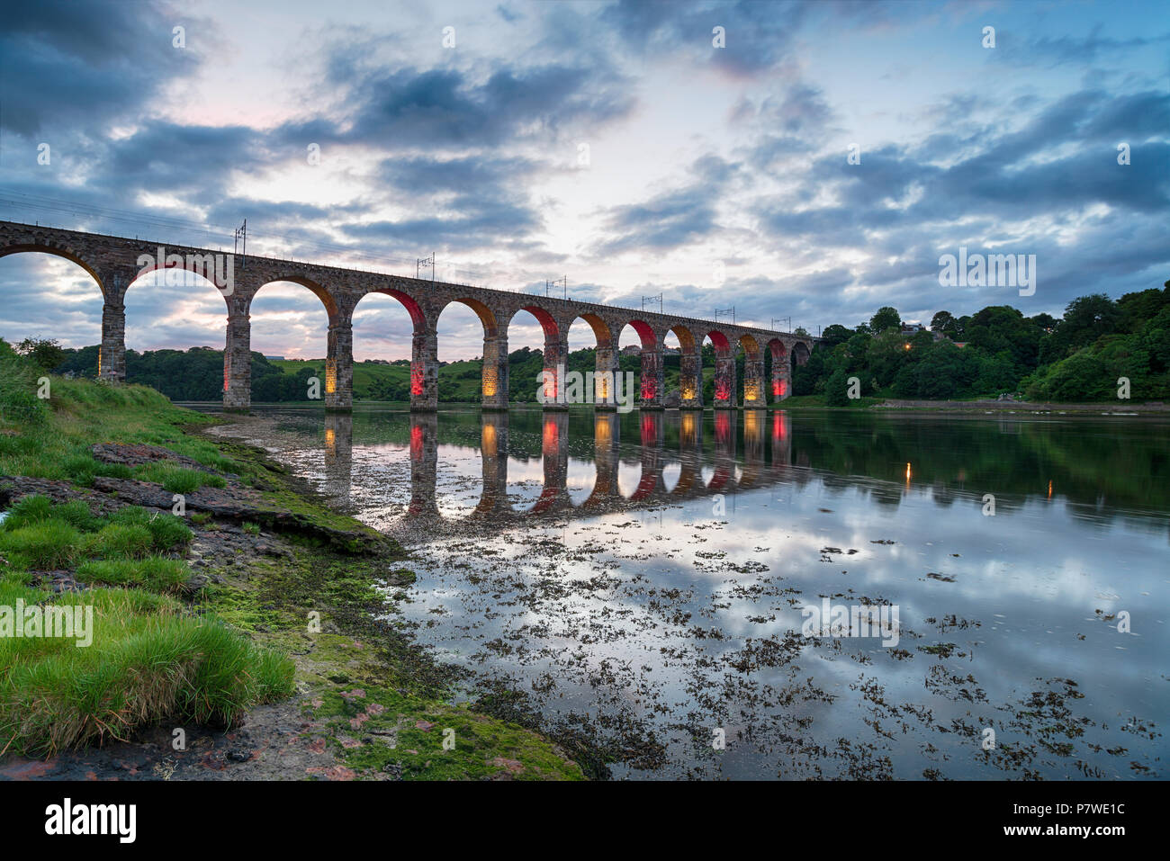 The Royal Border Bridge illuminated at dusk in Berwick on Tweed in ...