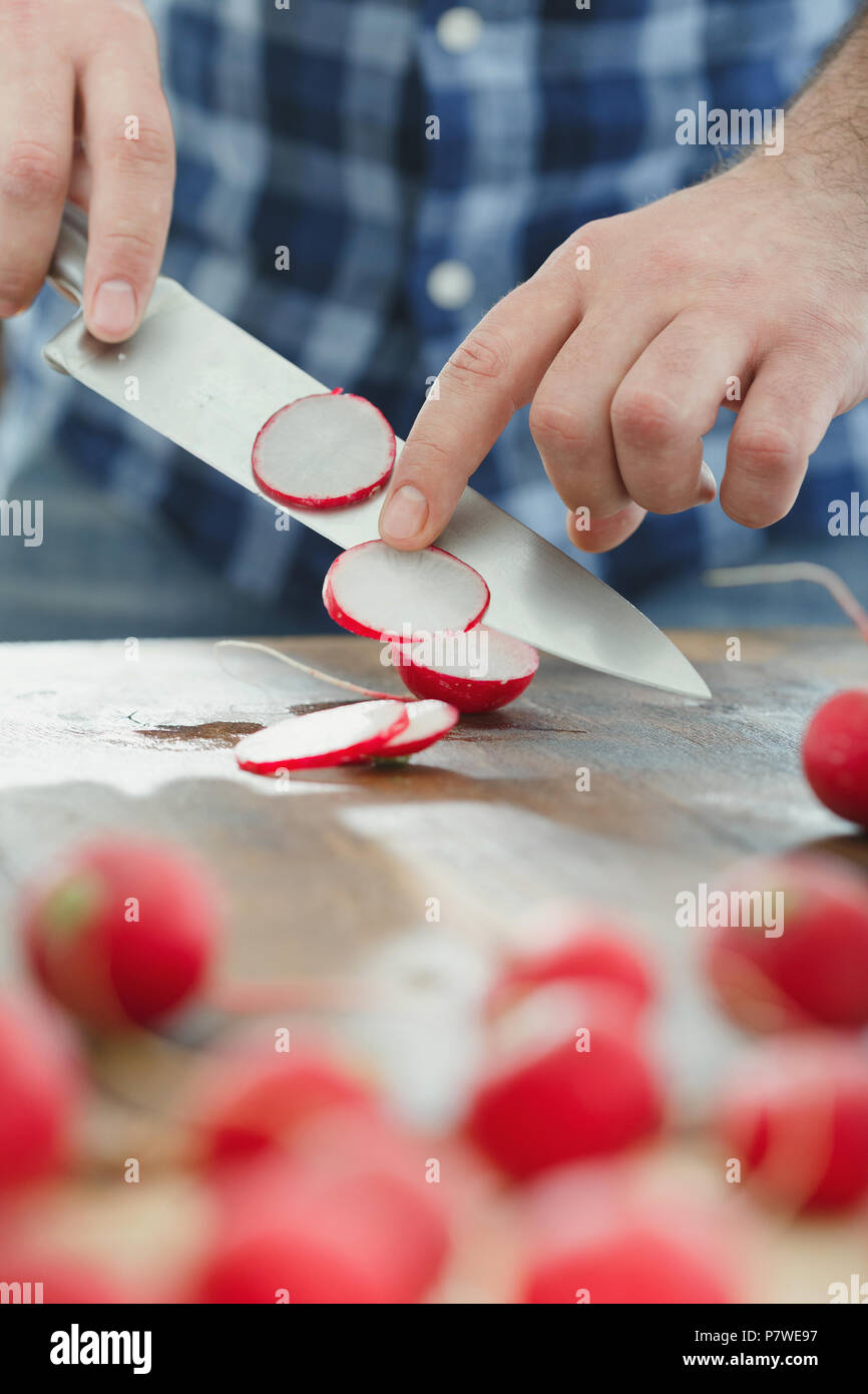 Hands cook knife big piece hi-res stock photography and images - Alamy