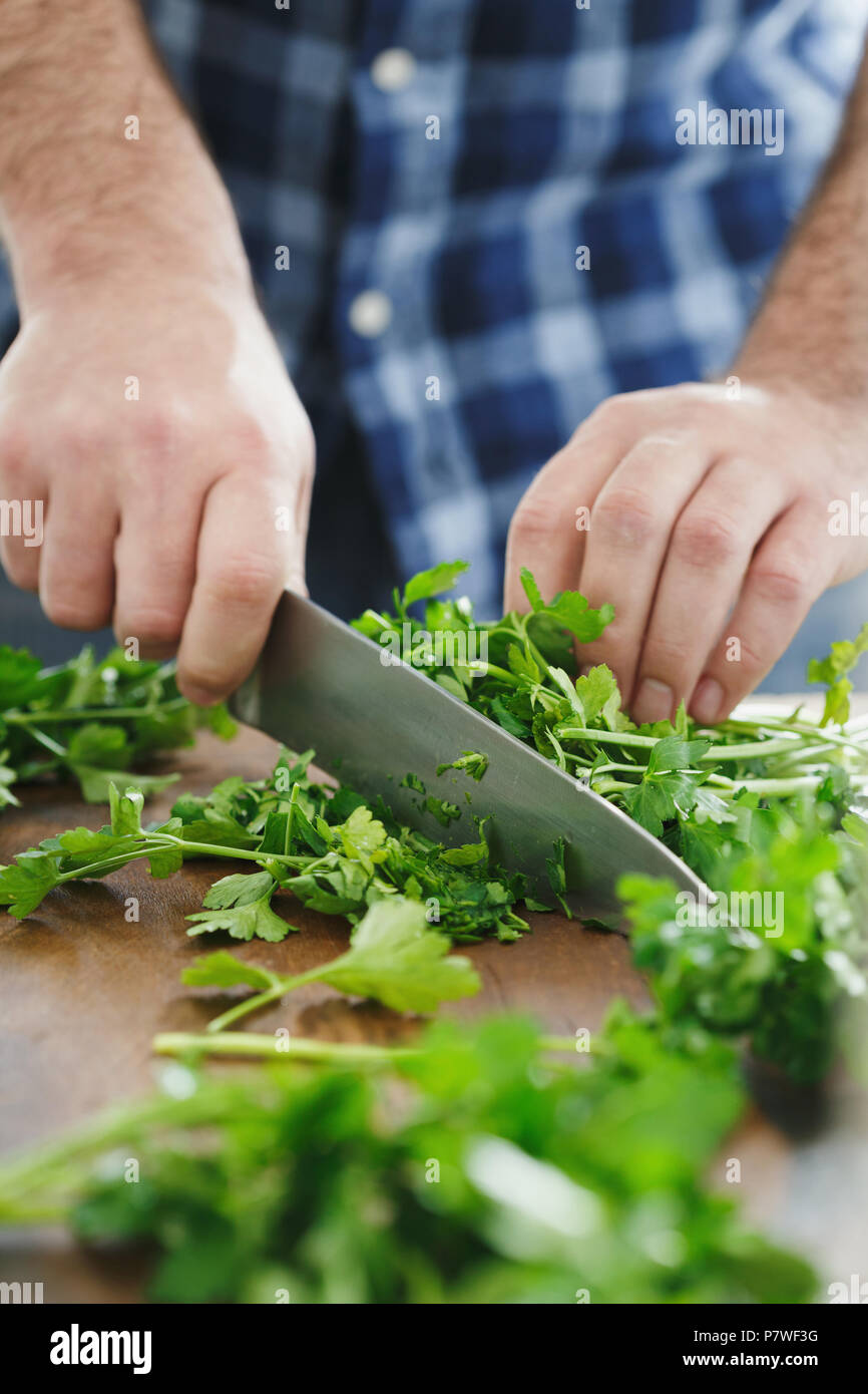 Chopping parsley hi-res stock photography and images - Alamy