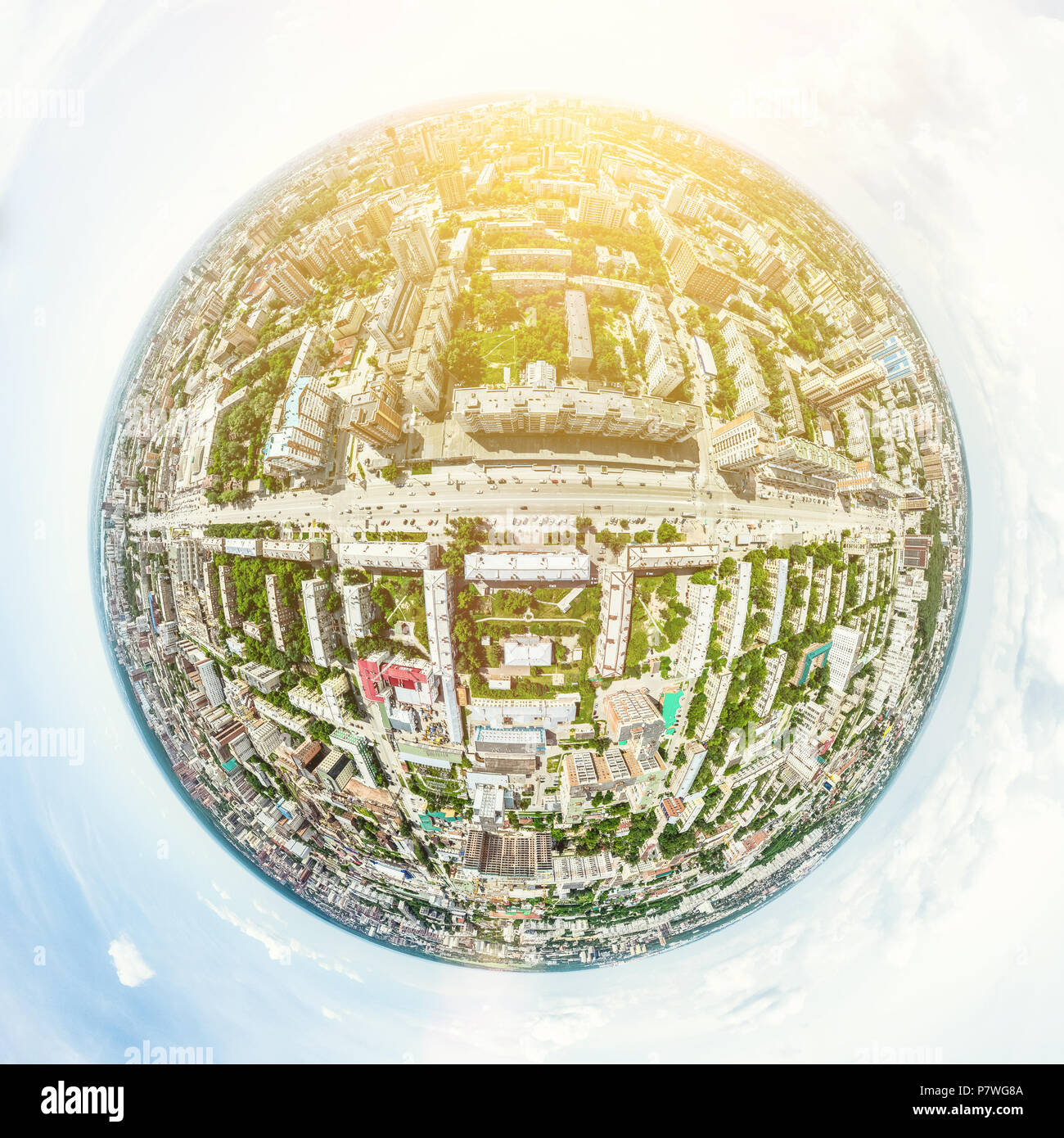 Aerial city view with crossroads and roads, houses, buildings, parks ...