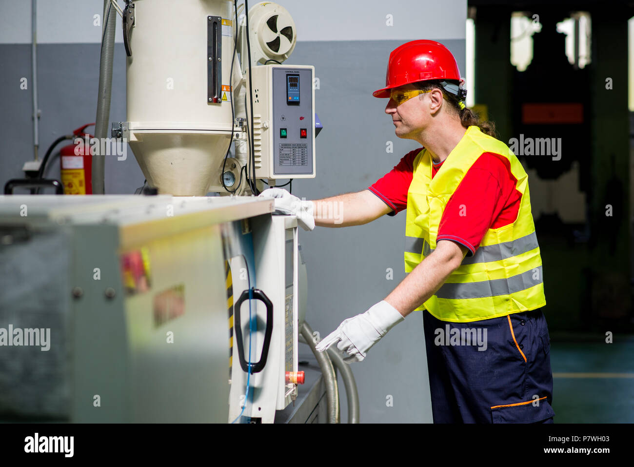 Worker wearing uniform hi-res stock photography and images - Alamy