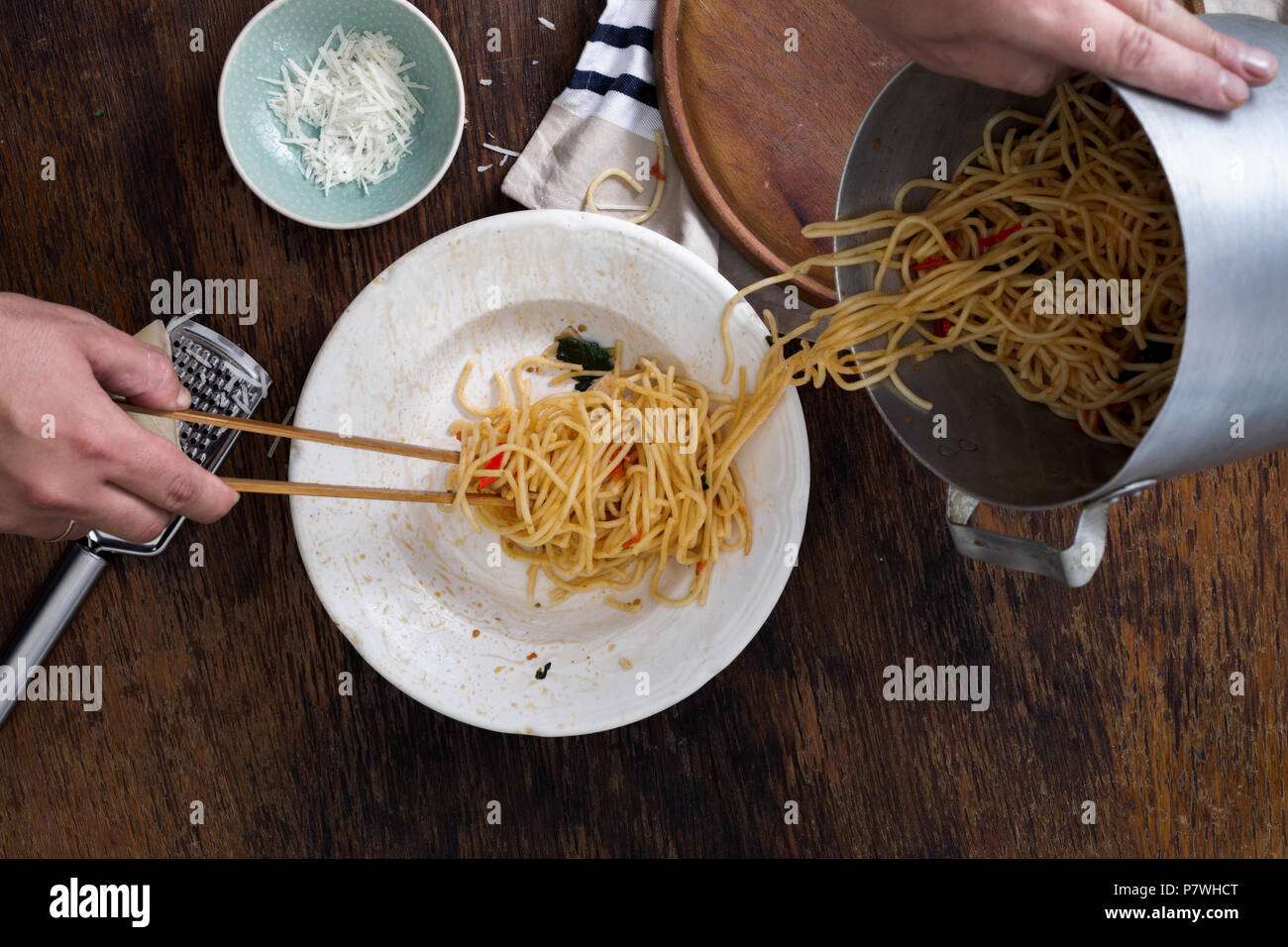Man is having supper Italian pasta. Top view. Dinner table concept ...