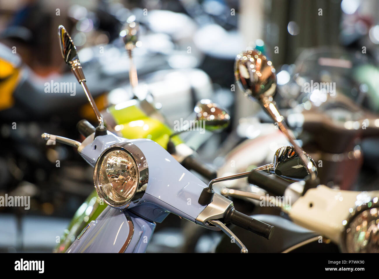 Detail of small motorcycle headlight and mirrors on handlebar Stock ...
