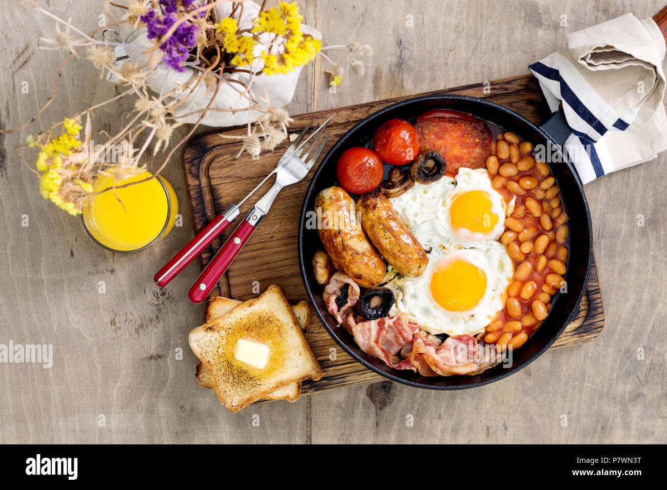 Full english breakfast man hi-res stock photography and images - Alamy