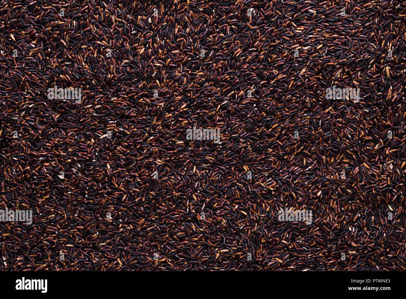Seeds of black rice. Healthy food background Stock Photo - Alamy