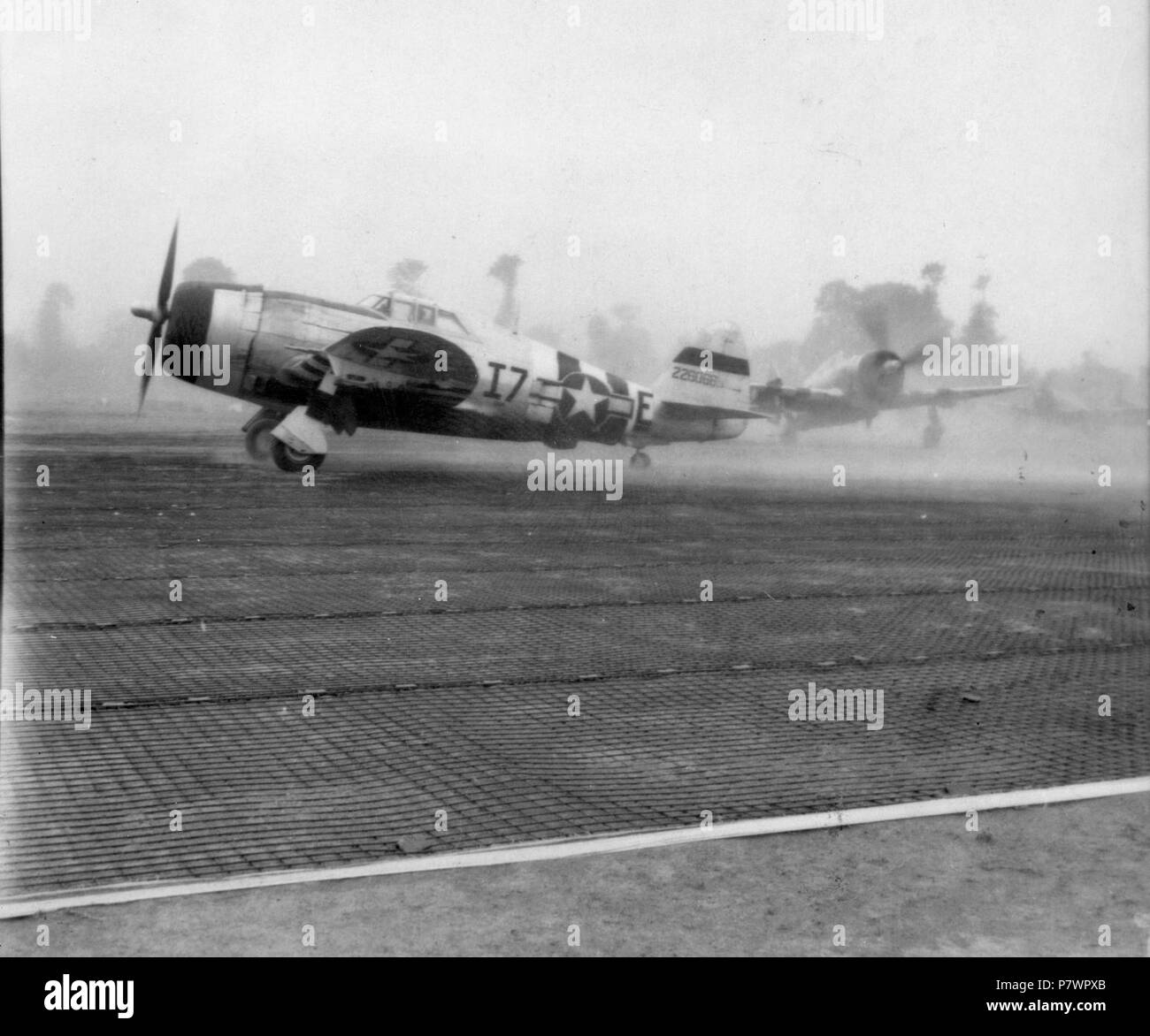 48th Fighter Group P-47Ds taking off at Deux Jumeaux Airfield A-4 Stock ...