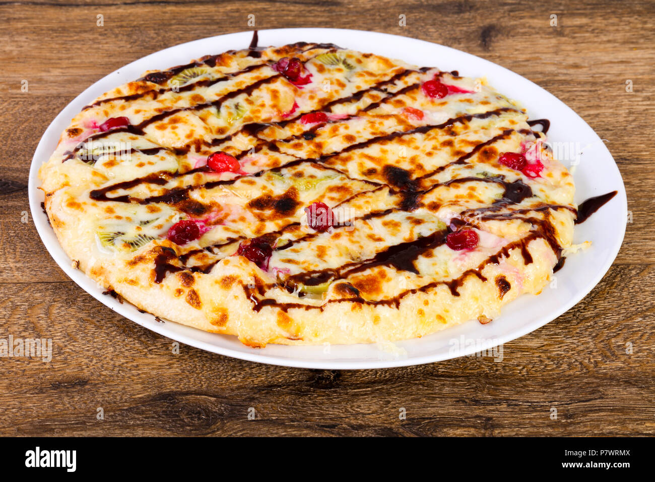 Sweet pizza with fruits and mozzarella Stock Photo - Alamy