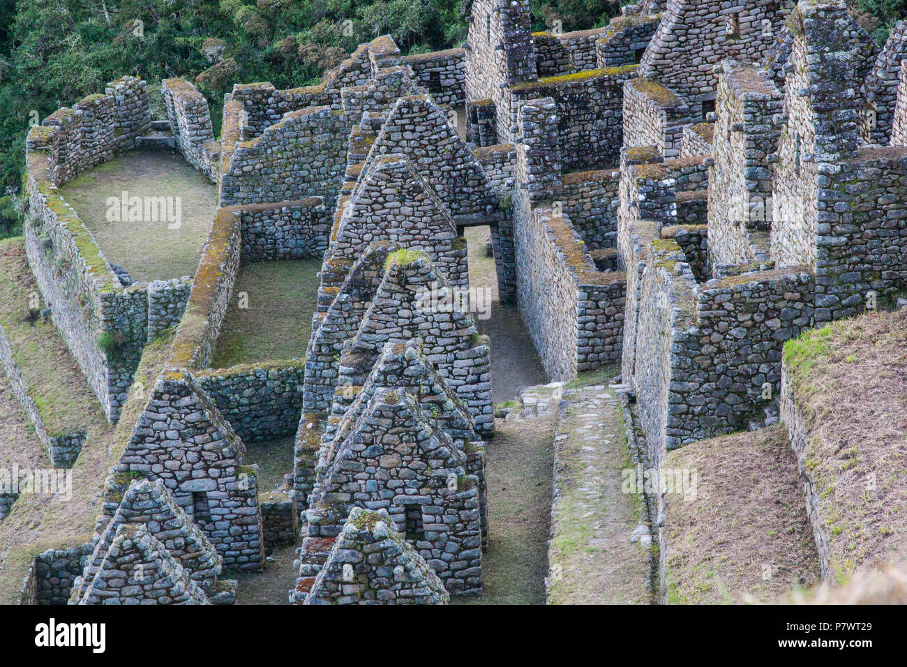 Ancient stone ruins of an Inca town on the Inca Trail in the Andes ...