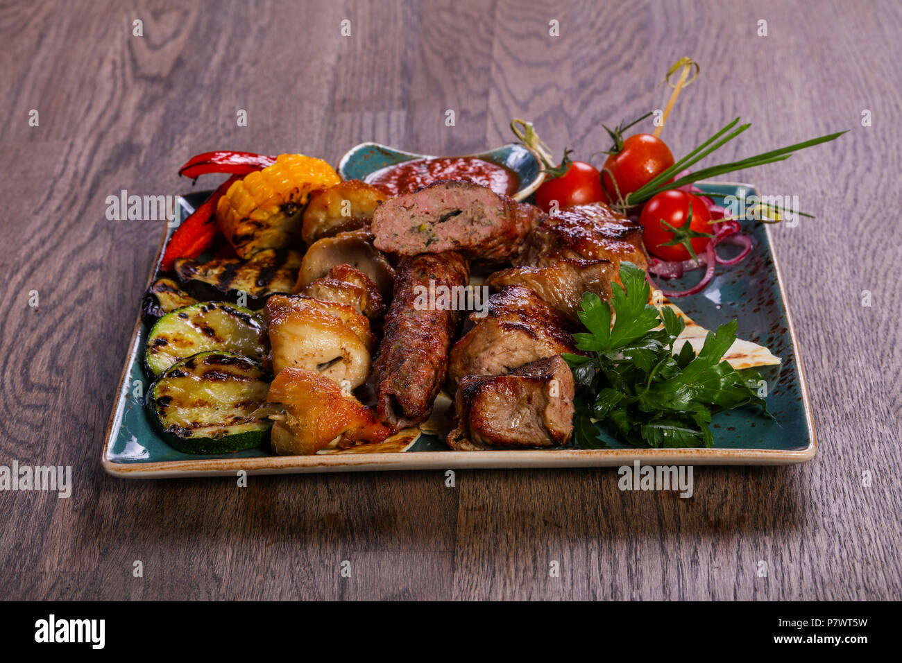 Grilled plate mix assortment meat Stock Photo - Alamy