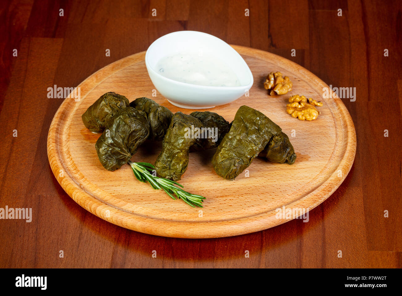 Caucasian traditional Dolma with sauce Stock Photo - Alamy