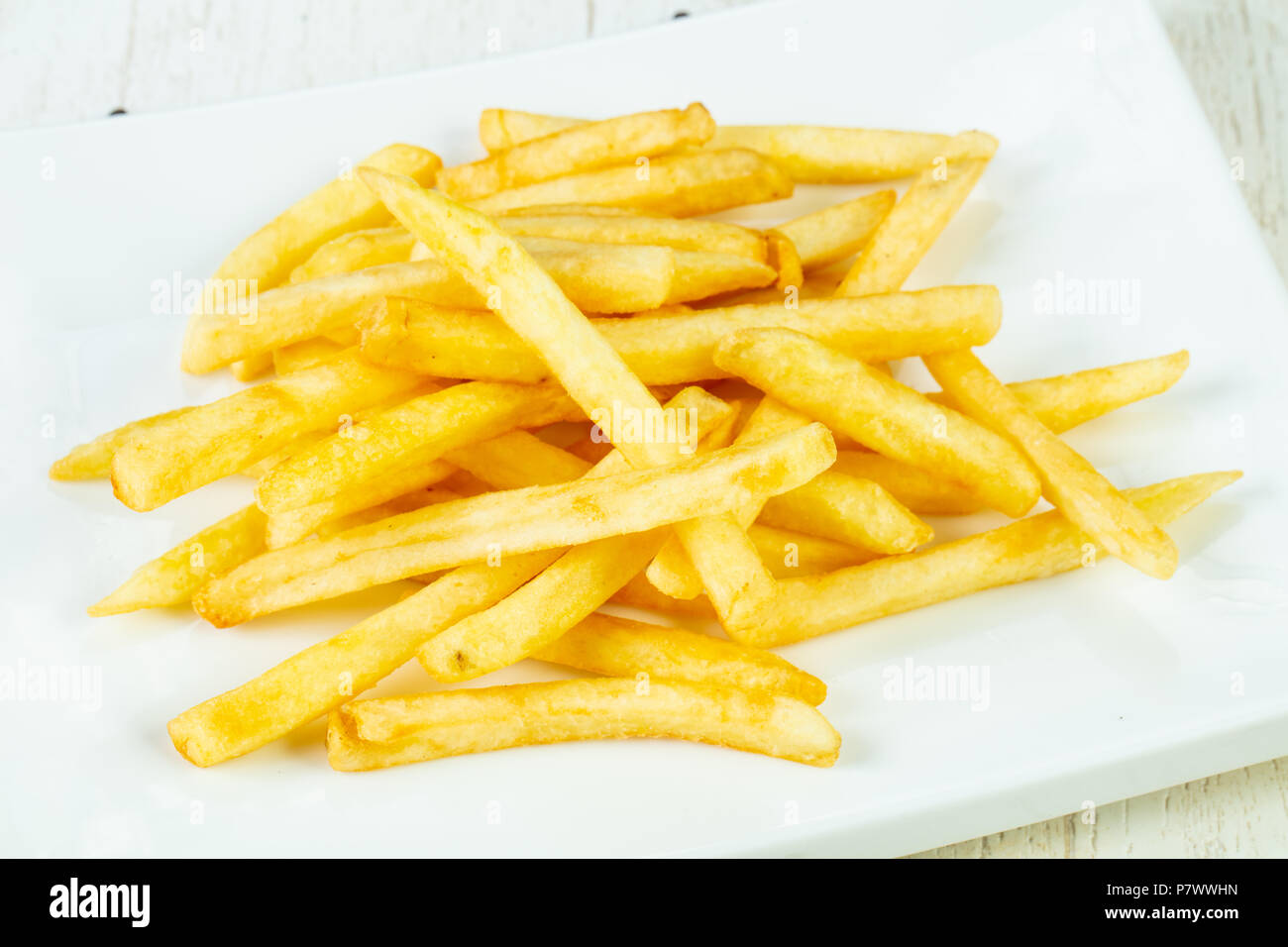 Hot tasty French fries potato Stock Photo - Alamy