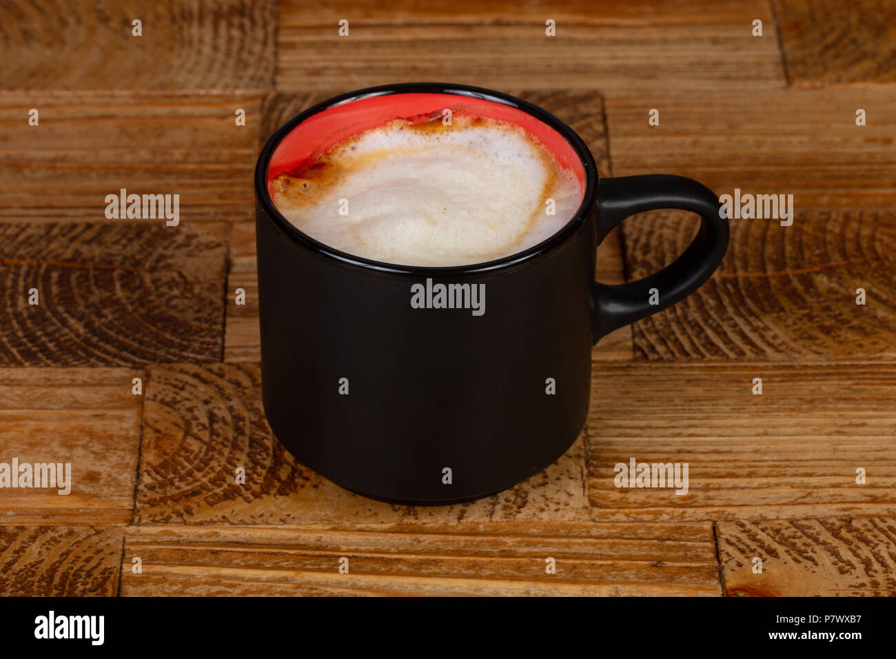 Tasty cup of latte with foam Stock Photo - Alamy