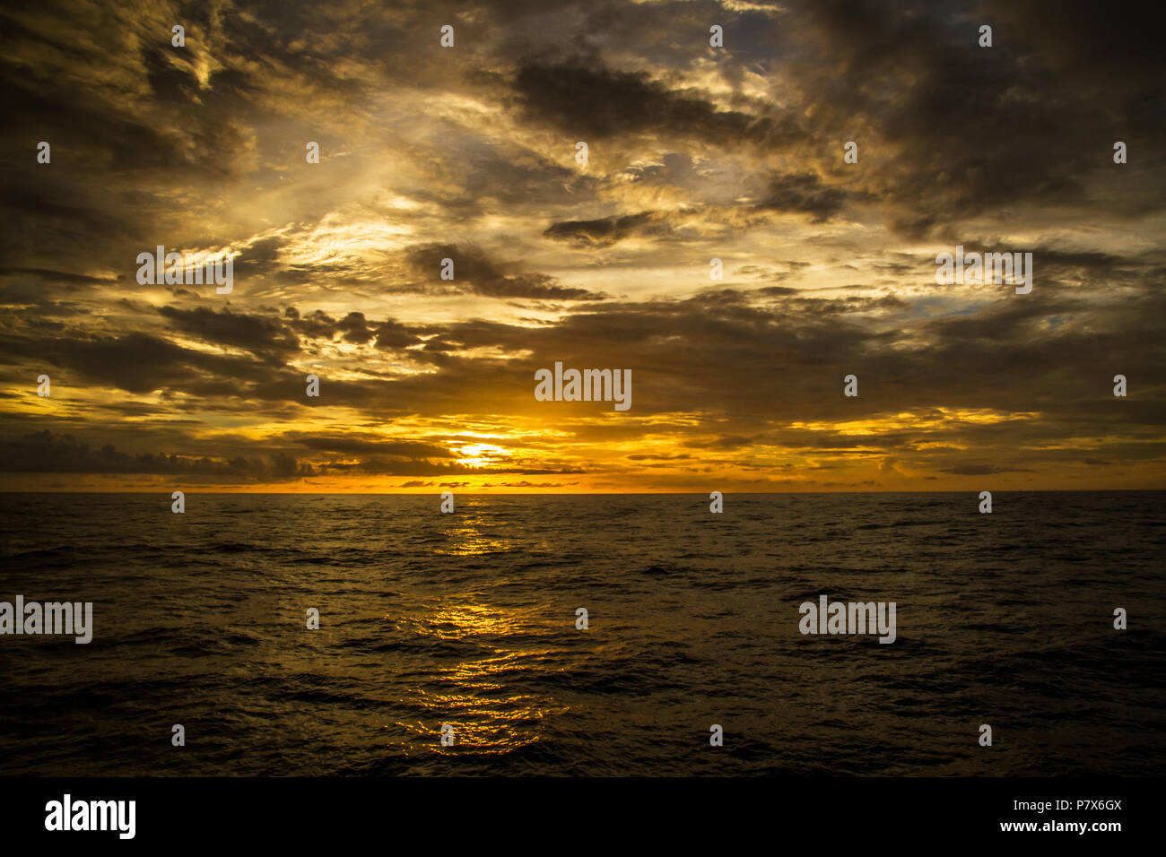 Advertising, Travel, Vacation and Holiday Concept - Beautiful sunset on ...