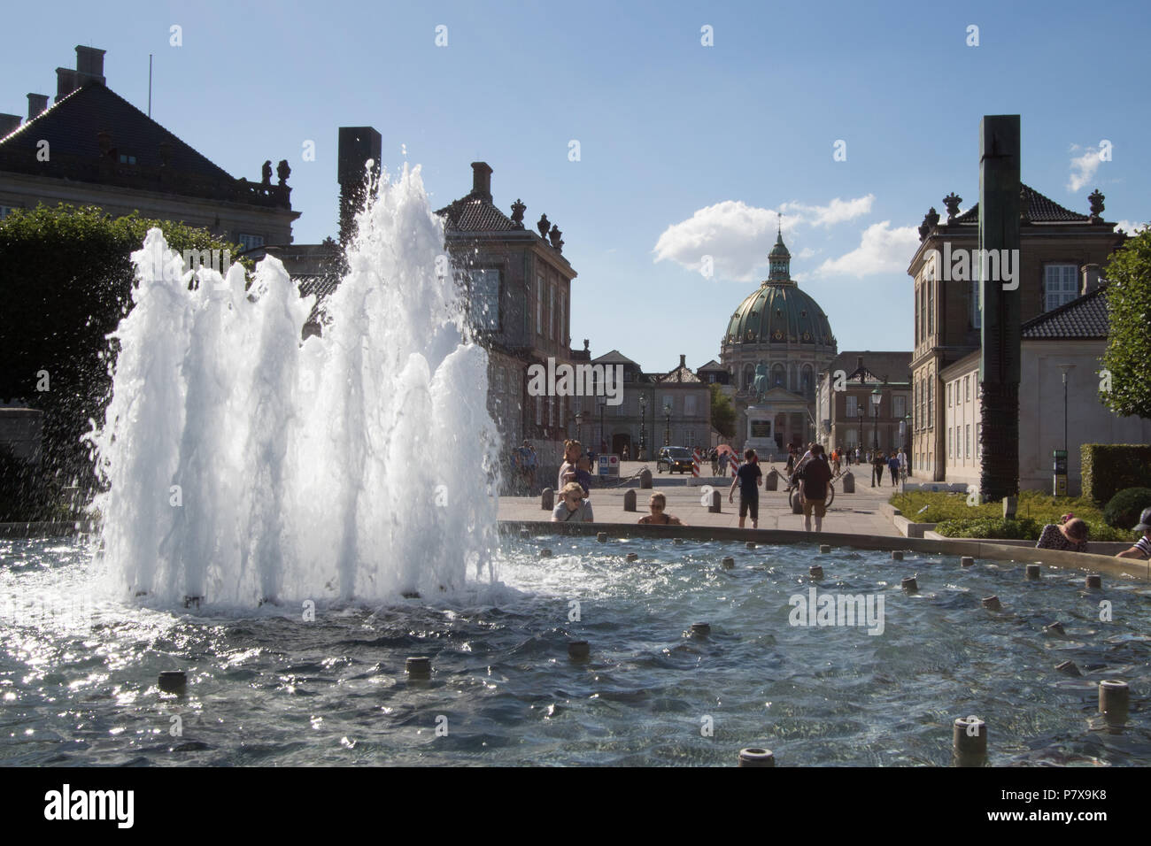 The Amalienborg Palace with a fountain, Copenhagen, Denmark Stock Photo ...