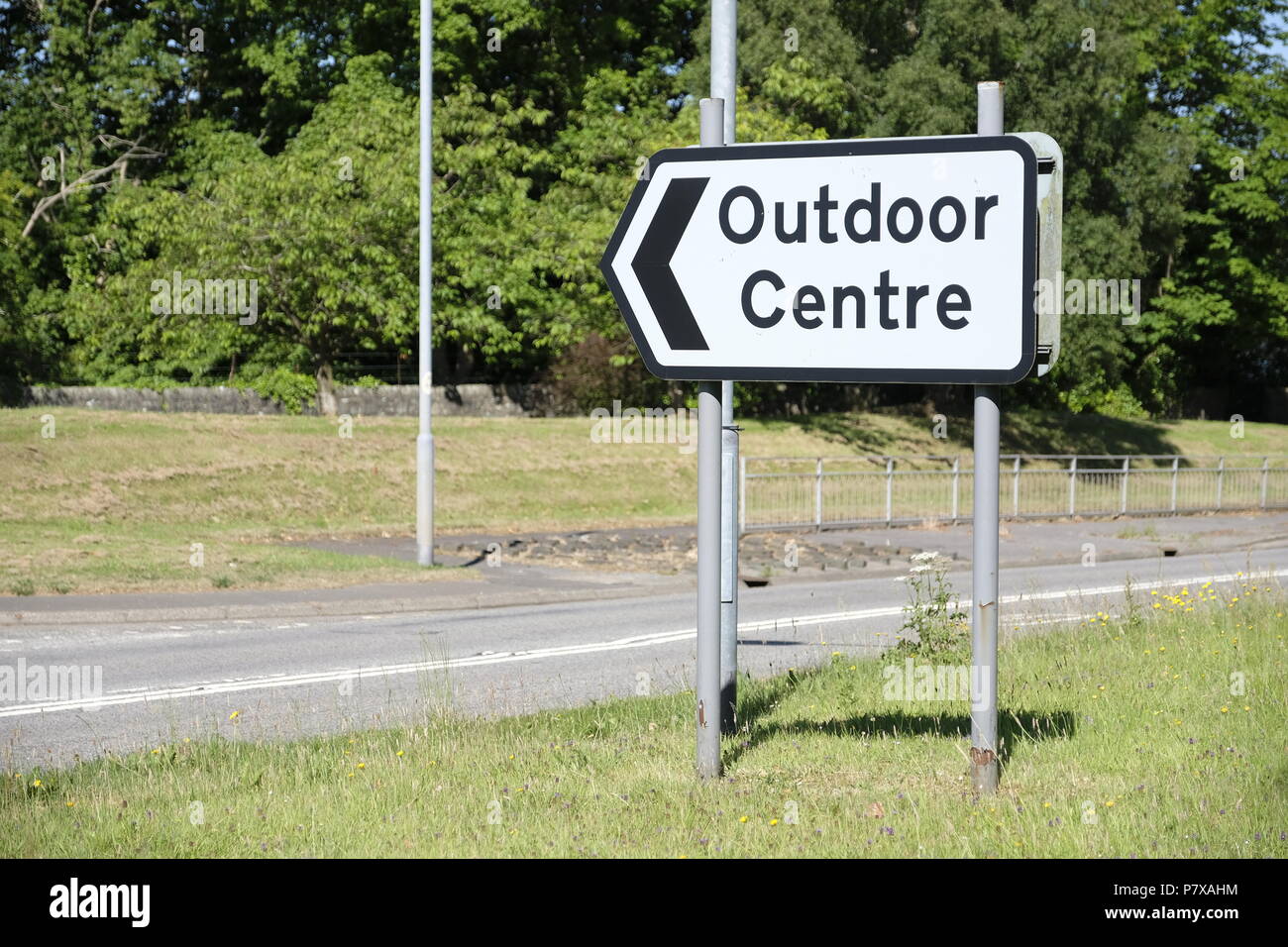 Outdoor centre road sign direction information Stock Photo - Alamy