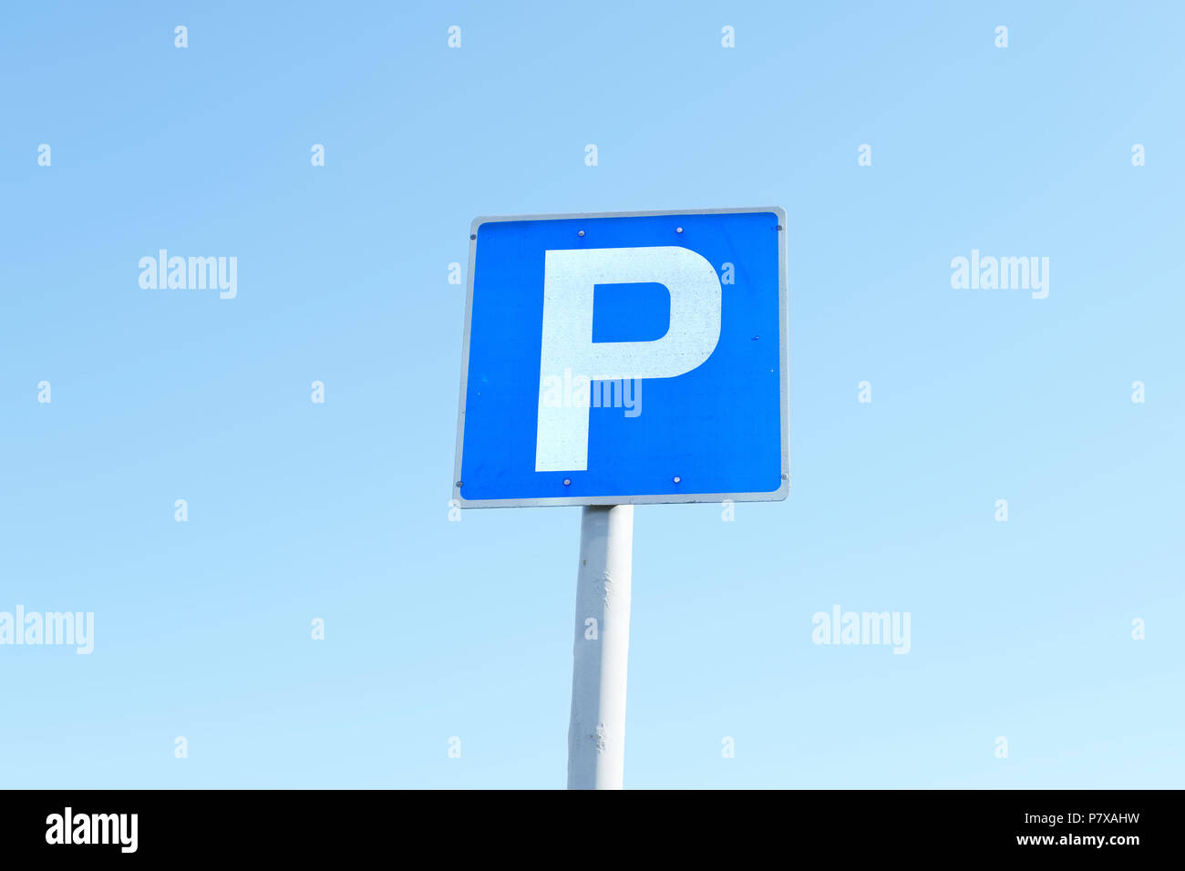 Parking P sign blue white square against sky background Stock Photo - Alamy
