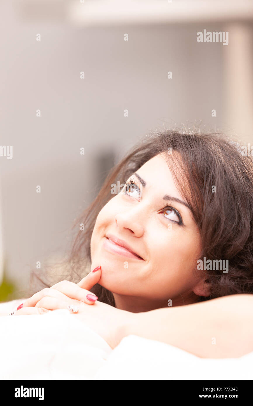 woman thinking or dreaming good things - concept of imagination Stock ...
