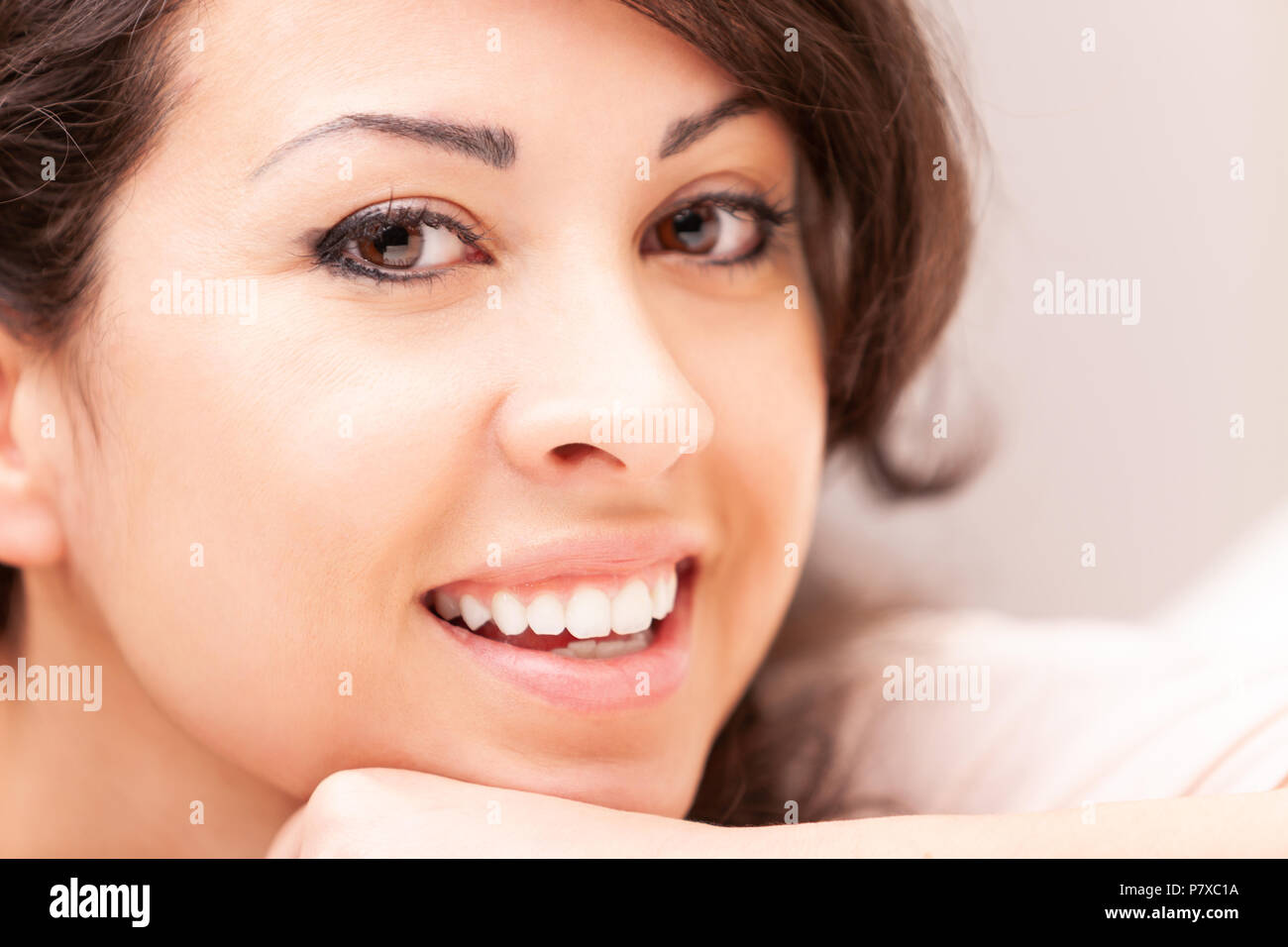 Coy expression hi-res stock photography and images - Alamy