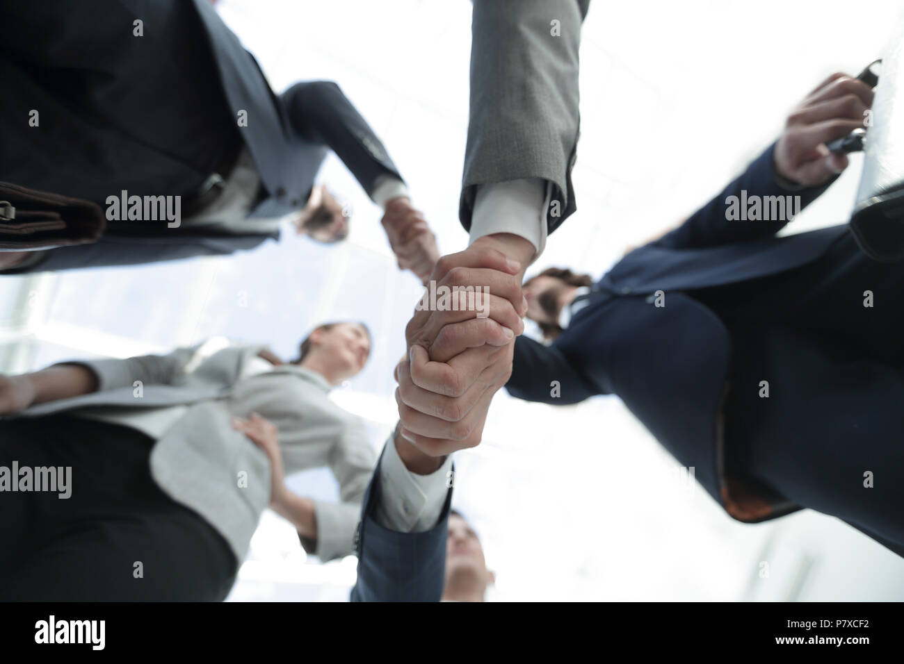 bottom view.business handshake Stock Photo - Alamy