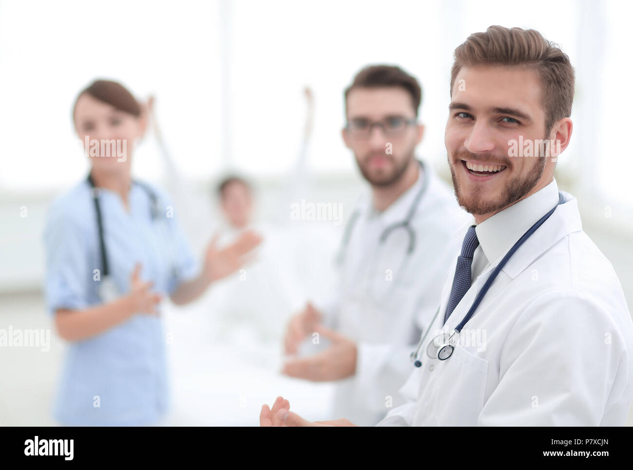 Doctors clapping hands and applauding on consent Stock Photo - Alamy