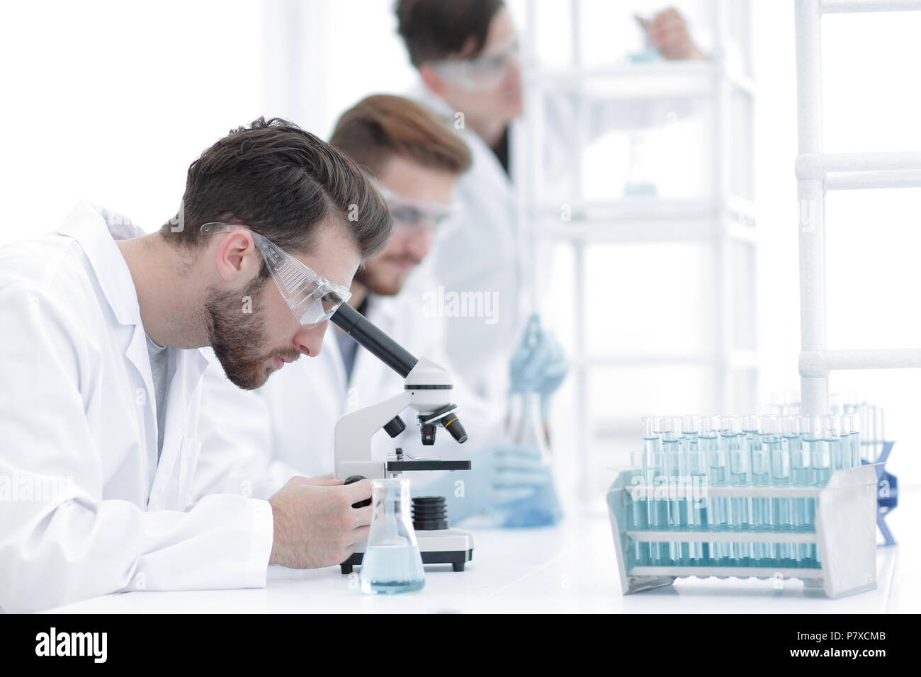background image scientists working with the microscope Stock Photo - Alamy