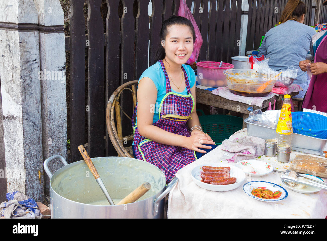 LUANG PRABANG, LAOS - 30 June 2018 - Happy congee or porridge female ...