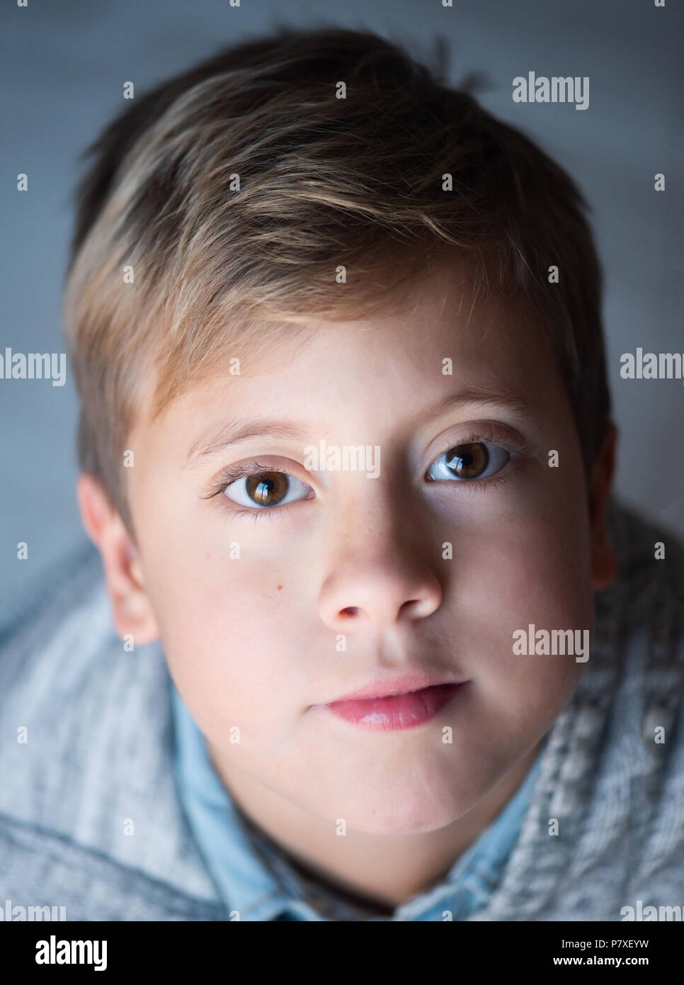 boy lying on bright background Stock Photo - Alamy