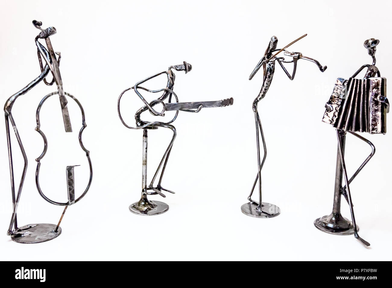 Figures of music performers made with welded black metal wire. Guitar ...