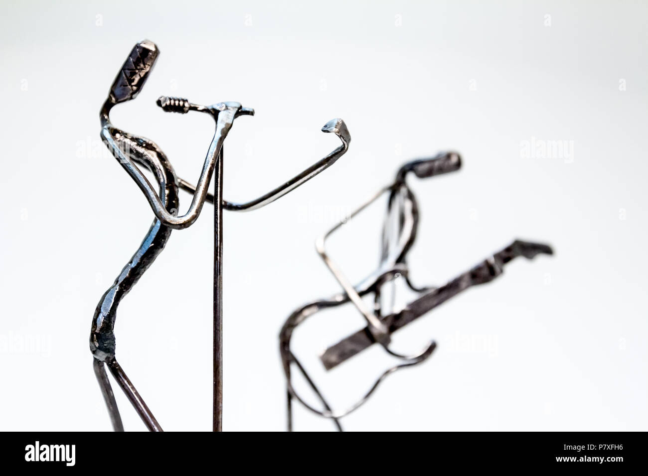 Figures of music performers made with welded black metal wire. Band ...