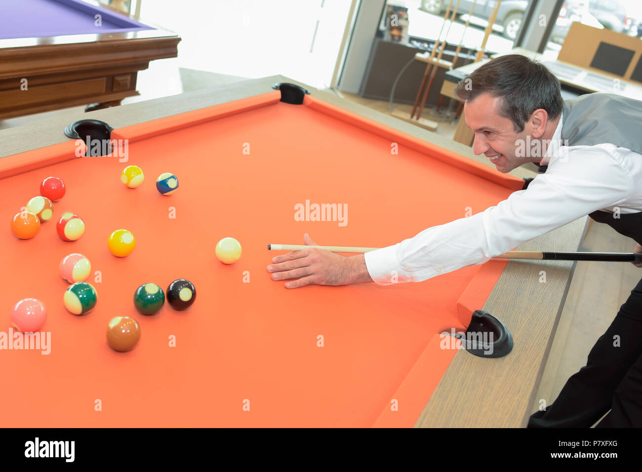 Guy playing billiards hi-res stock photography and images - Alamy