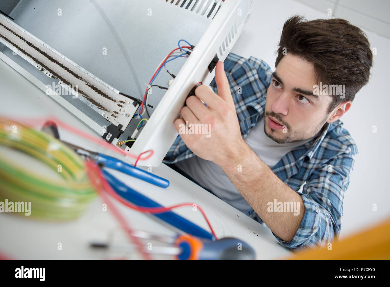 installing the cooling system of the cpu Stock Photo - Alamy