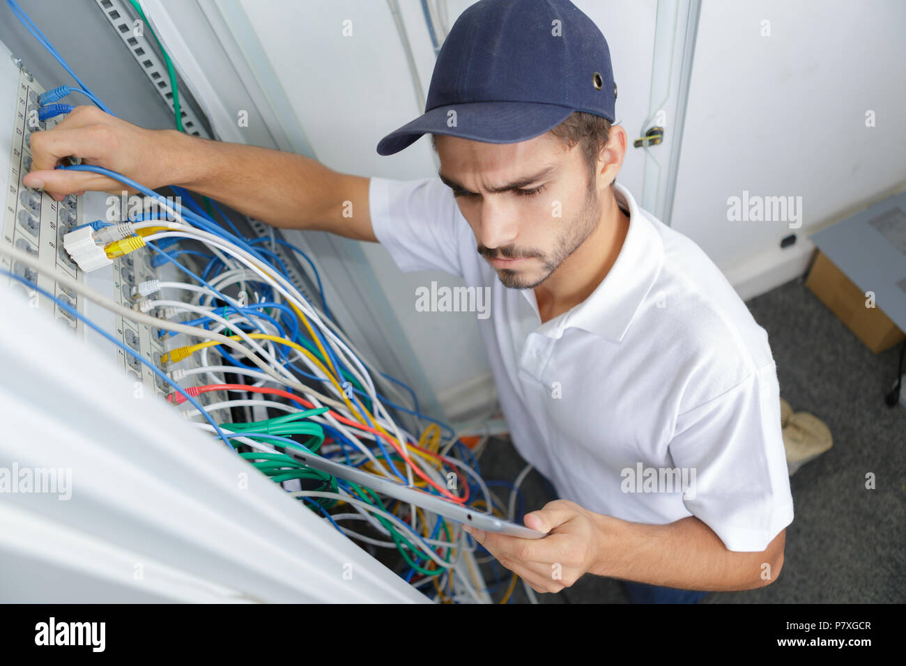 electrician wiring electrical panel Stock Photo - Alamy