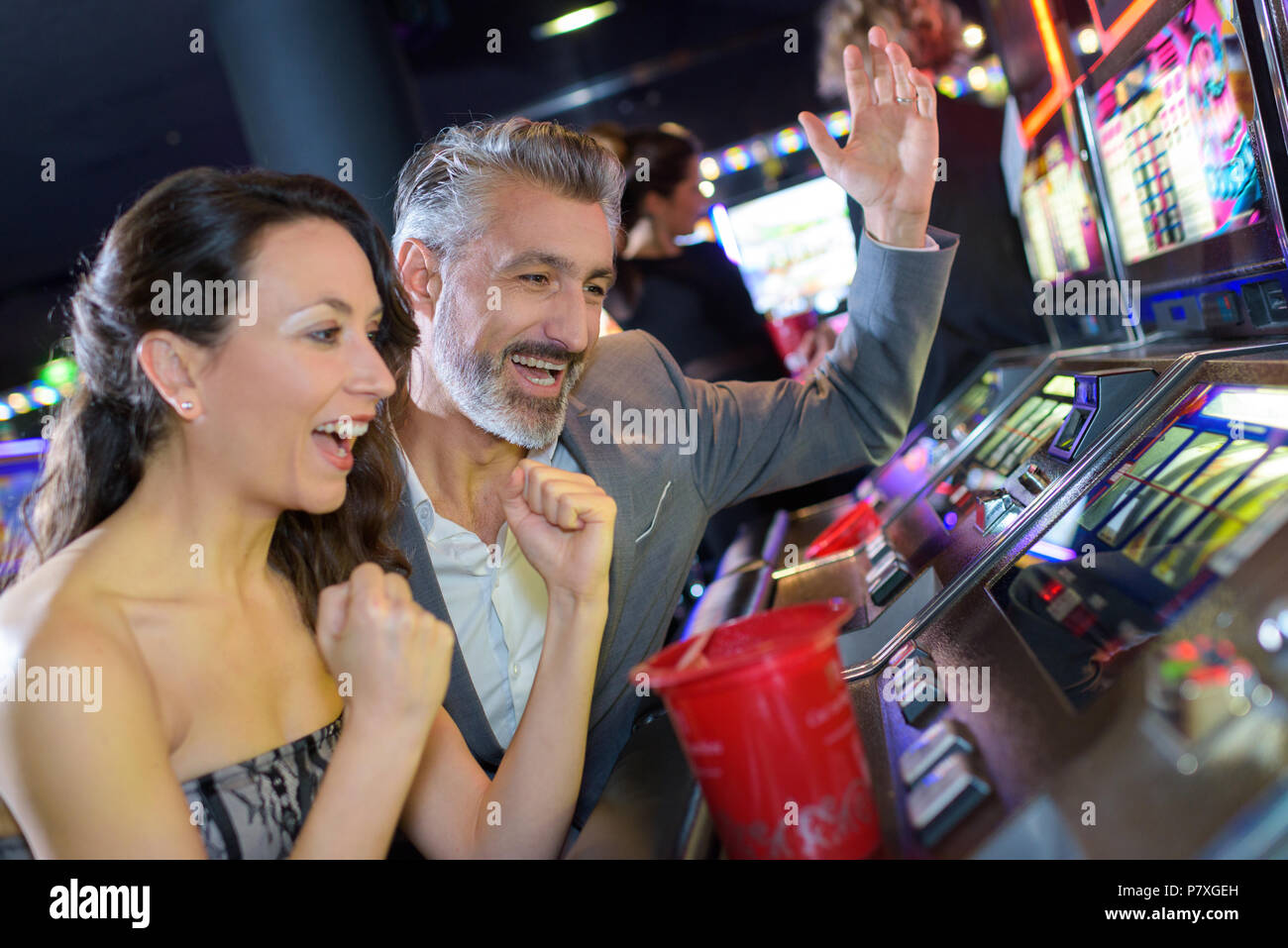 Triumphant couple hi-res stock photography and images - Alamy