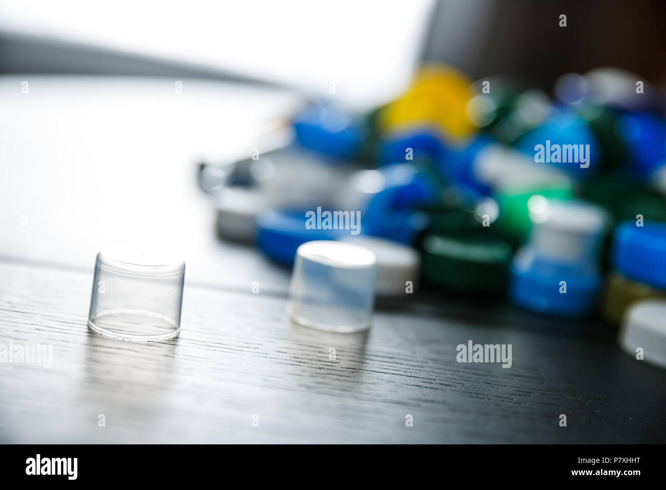 Collection of various colorful plastic screw caps Stock Photo - Alamy