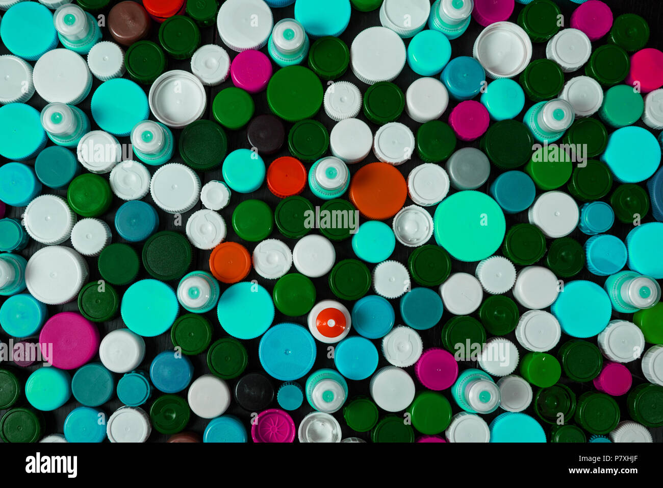 Collection of various colorful plastic screw caps Stock Photo - Alamy