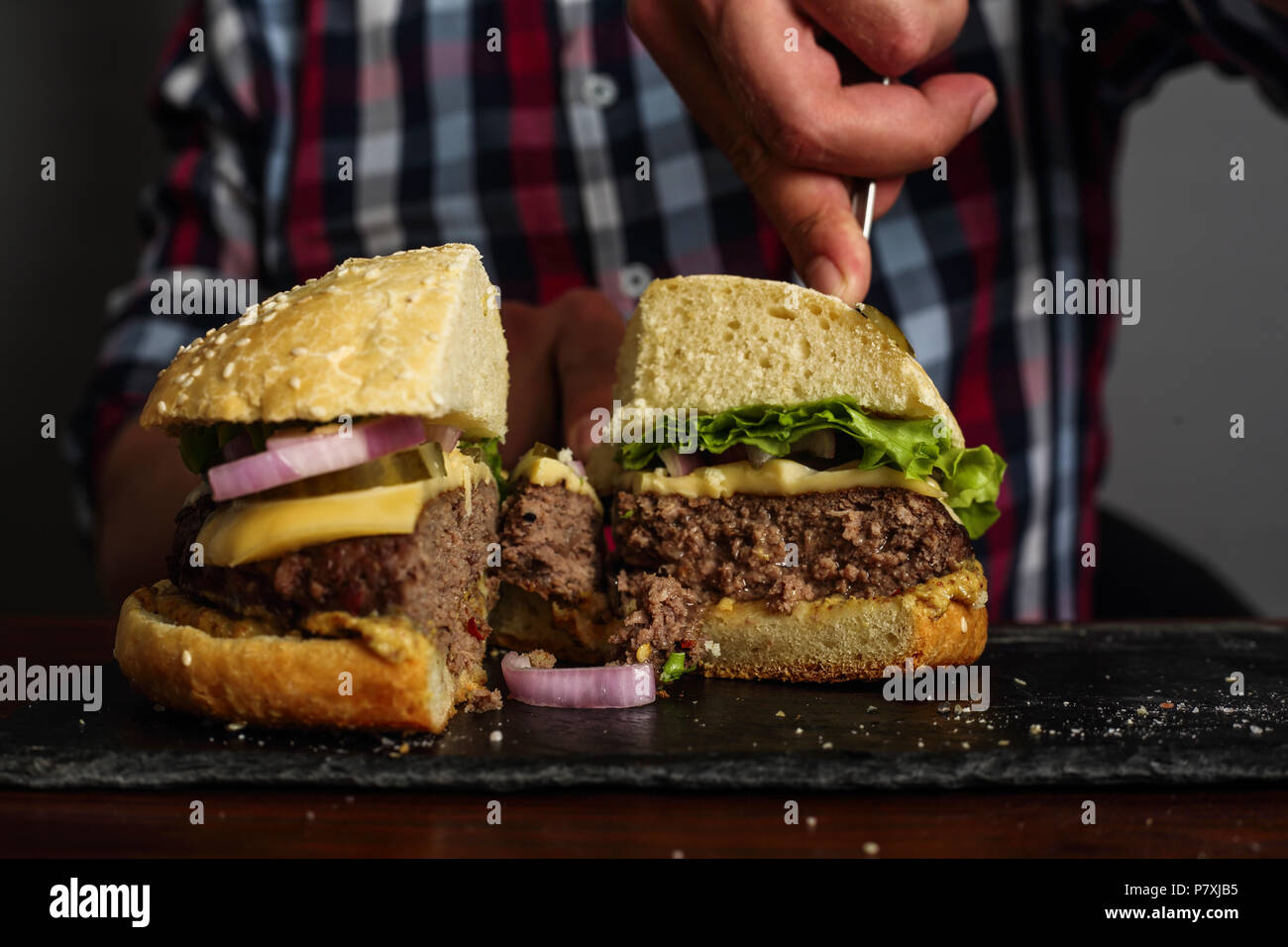 Handsome man eating fork knife hi-res stock photography and images - Alamy