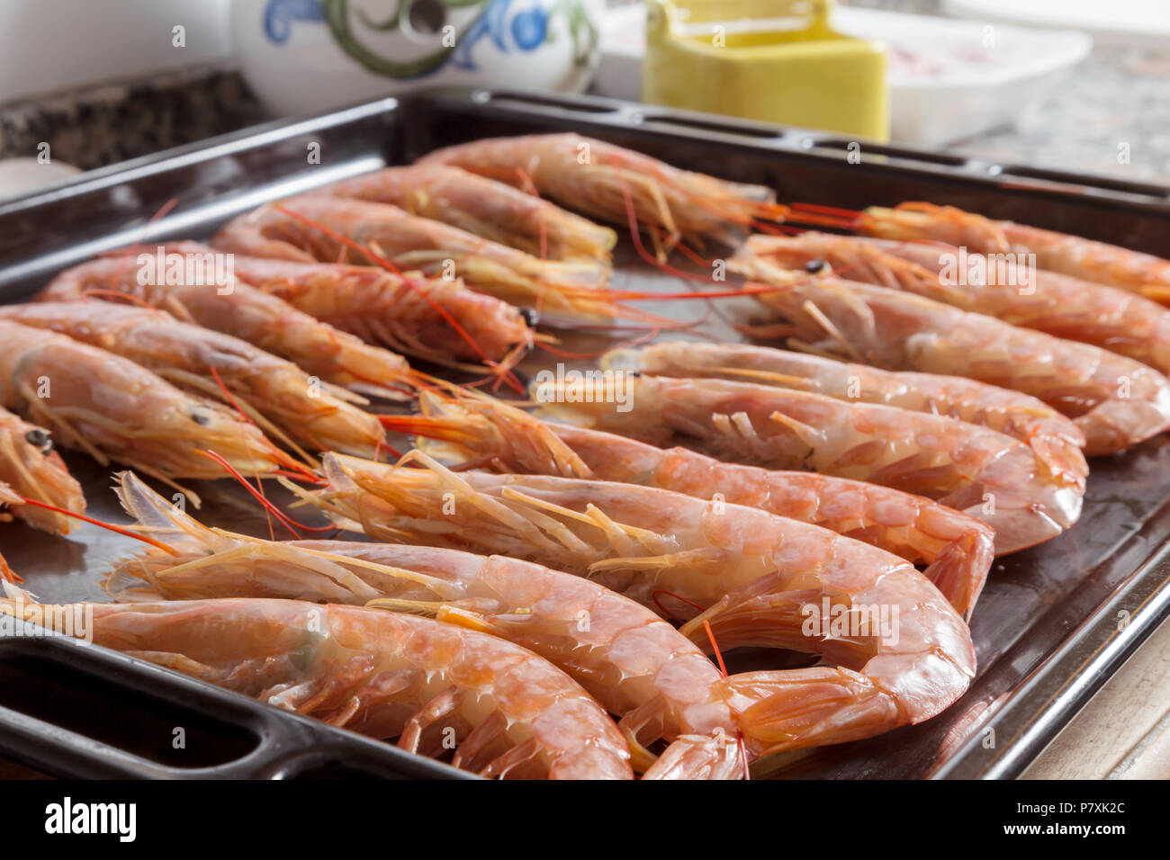 tray with prawns prepared for cooking in the oven Stock Photo - Alamy