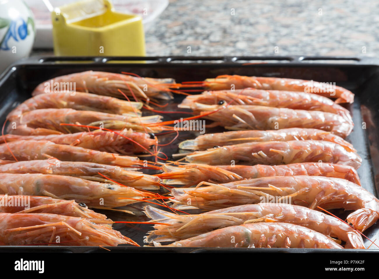 tray with prawns prepared for cooking in the oven Stock Photo - Alamy