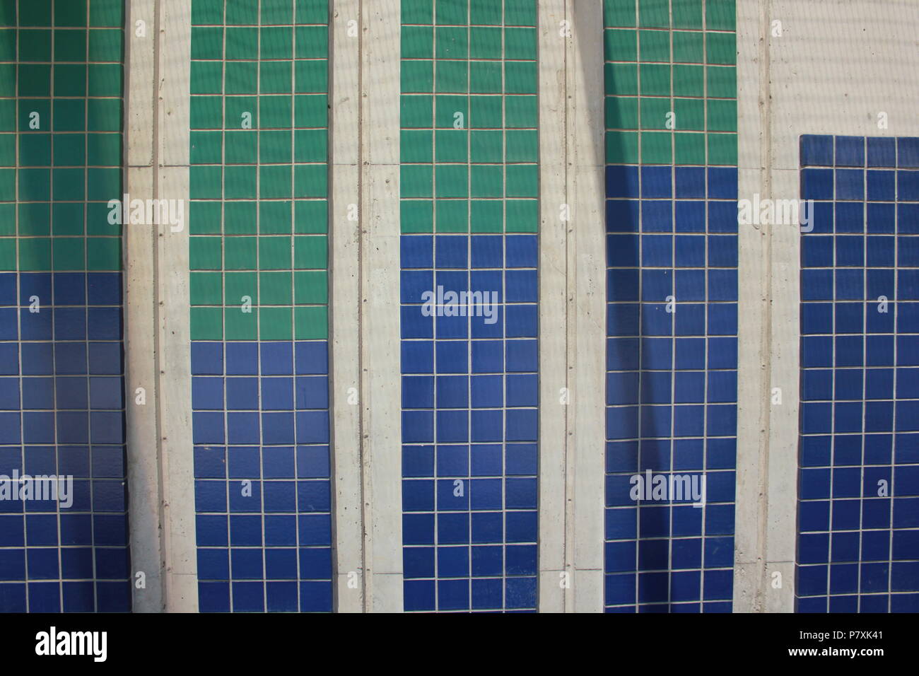 Green and blue tile decorated exterior wall at the CTA Blue Line Train ...