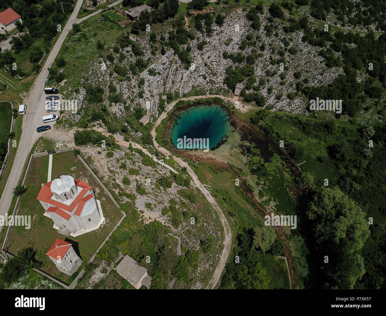 The spring of the Cetina River (izvor Cetine) in the foothills of the ...