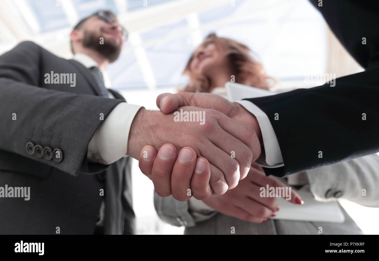 Photo of handshake of two happy businessmen Stock Photo - Alamy