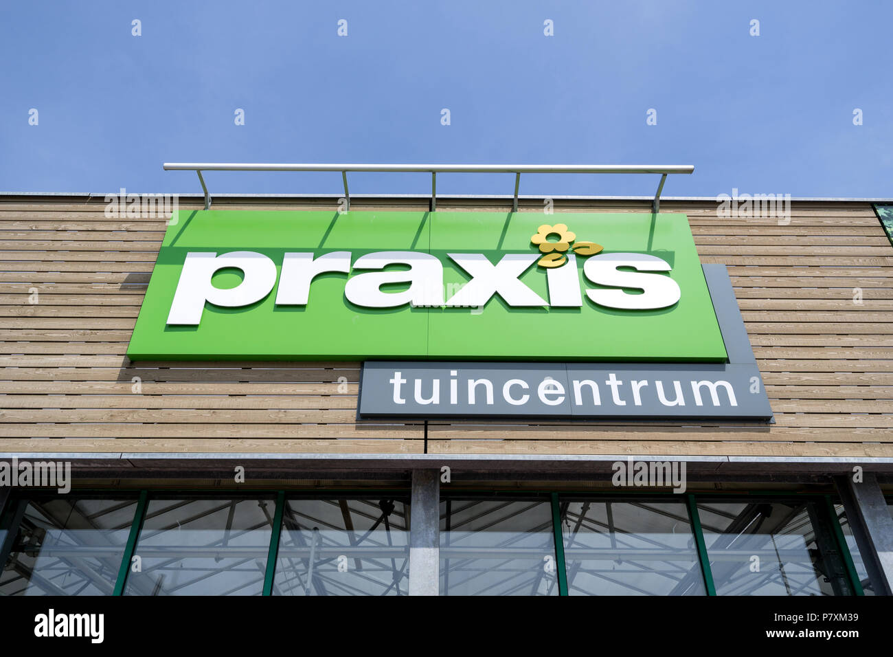 Praxis garden center sign at store. Praxis is a leading DIY brand in ...