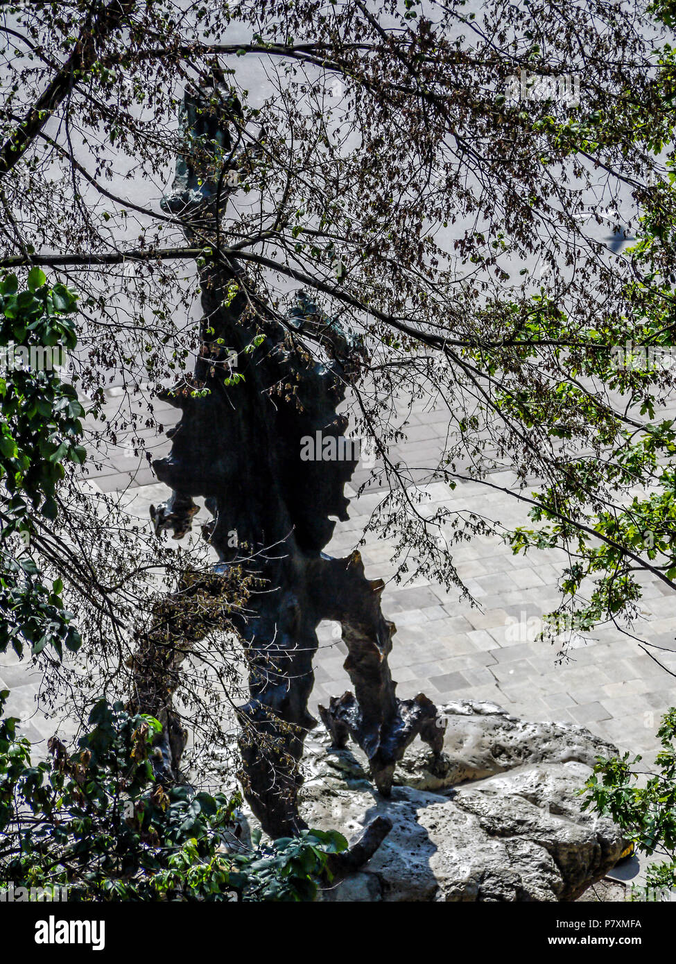Silhouette of a statue of legendary Wawel Dragon situated at the foot ...