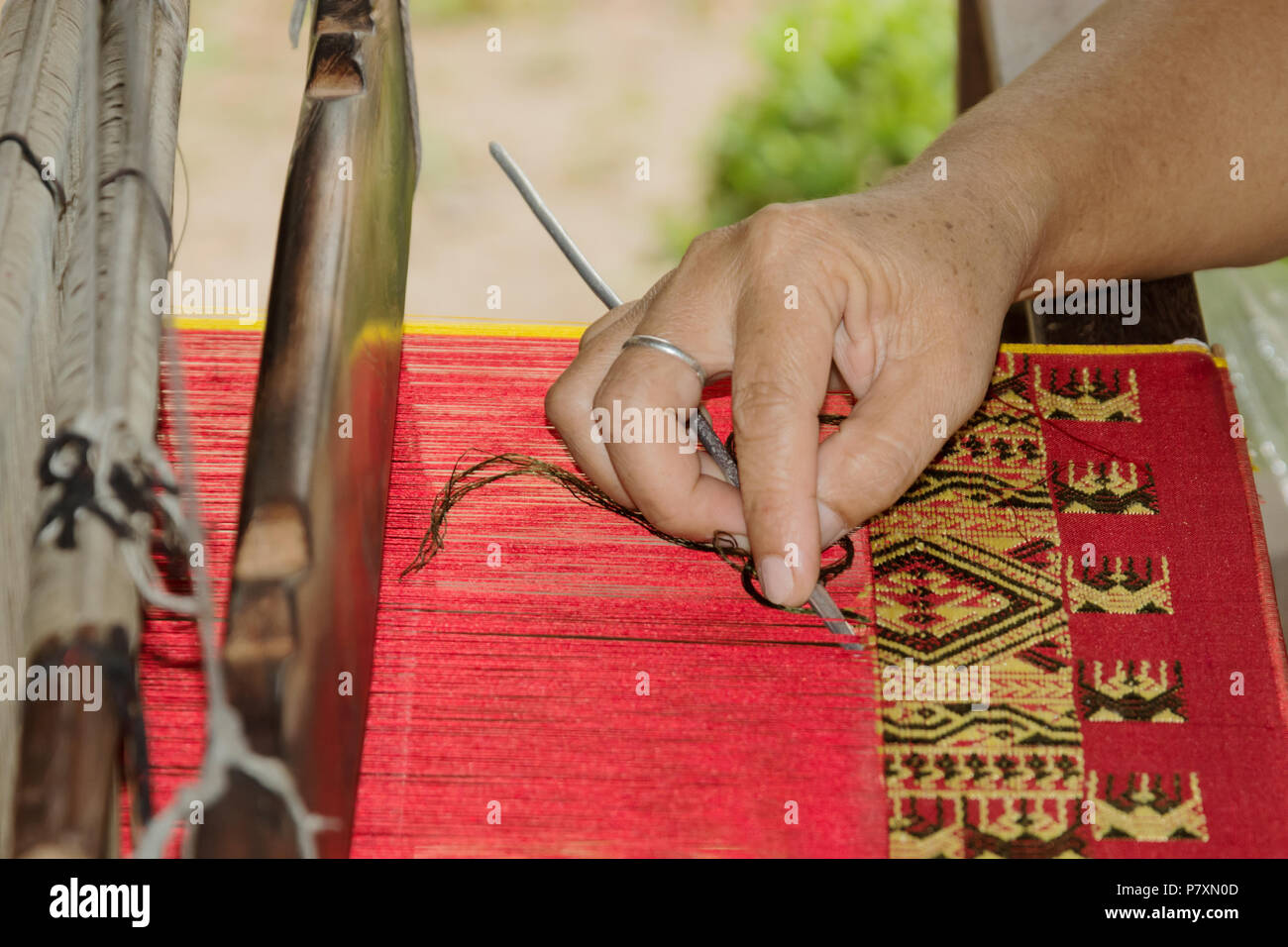 Hand of master, production of a tapestry on primitive machine tool ...
