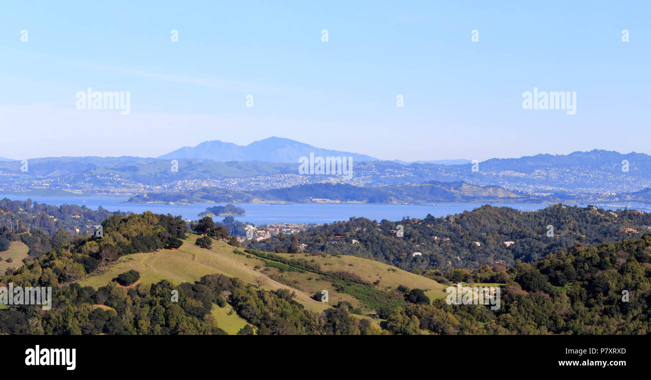 Green rolling hills of Marin County with view of San Francisco Bay ...