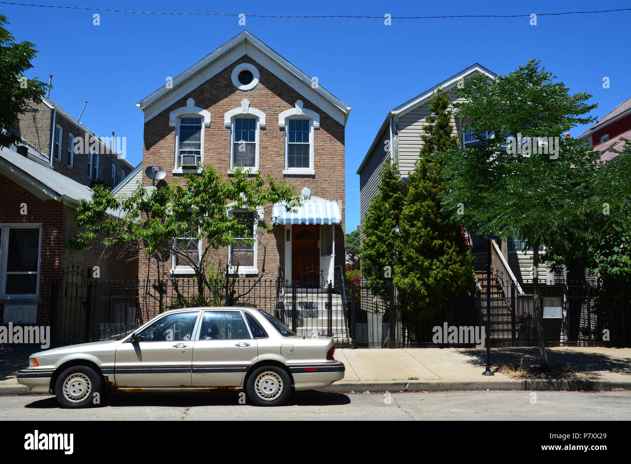 A typical turn of the century workers cottage on a residential street ...