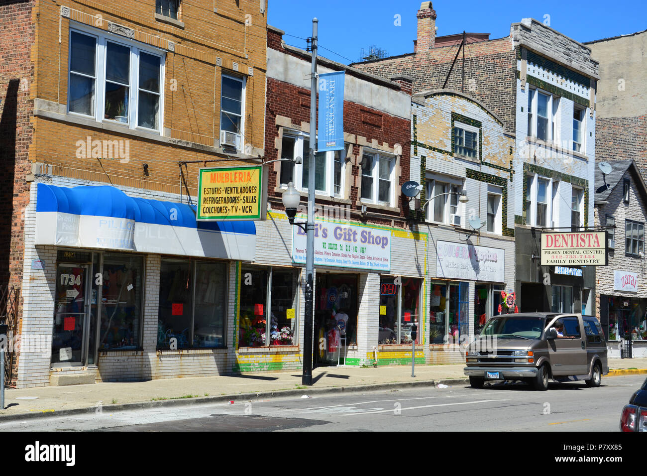 Businesses along 18th Street in Chicago's Pilsen neighborhood Stock ...